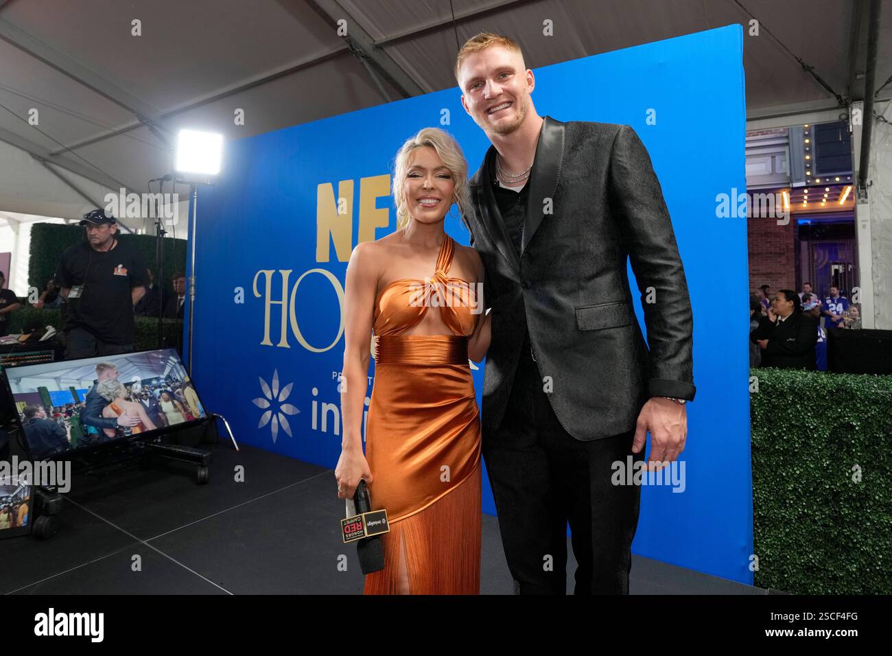 NFL Network talent Colleen Wolfe poses with Arizona Cardinals Trey ...