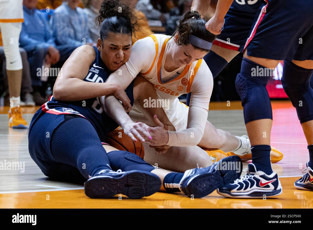 Tennessee forward Sara Puckett, second from left, battles for the ball with UConn center Jana El ...