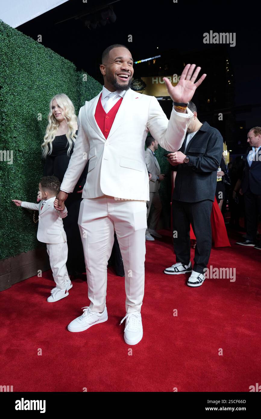 Los Angeles Chargers J.K. Dobbins walks the red carpet before the NFL ...