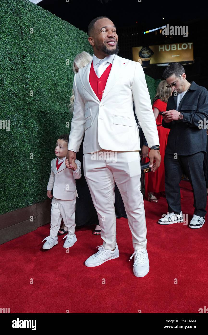 Los Angeles Chargers J.K. Dobbins walks the red carpet before the NFL ...