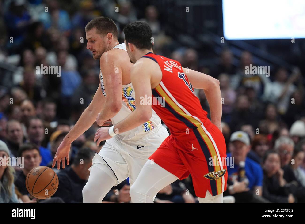 Denver Nuggets center Nikola Jokic (15) and New Orleans Pelicans center Karlo Matkovic (17) in ...