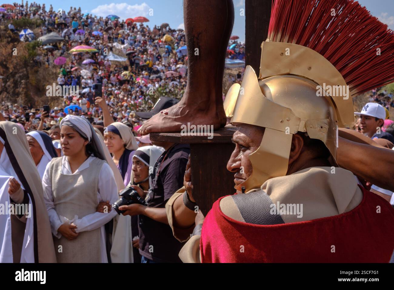 A representation of the Crucifixion is played out during the Good ...