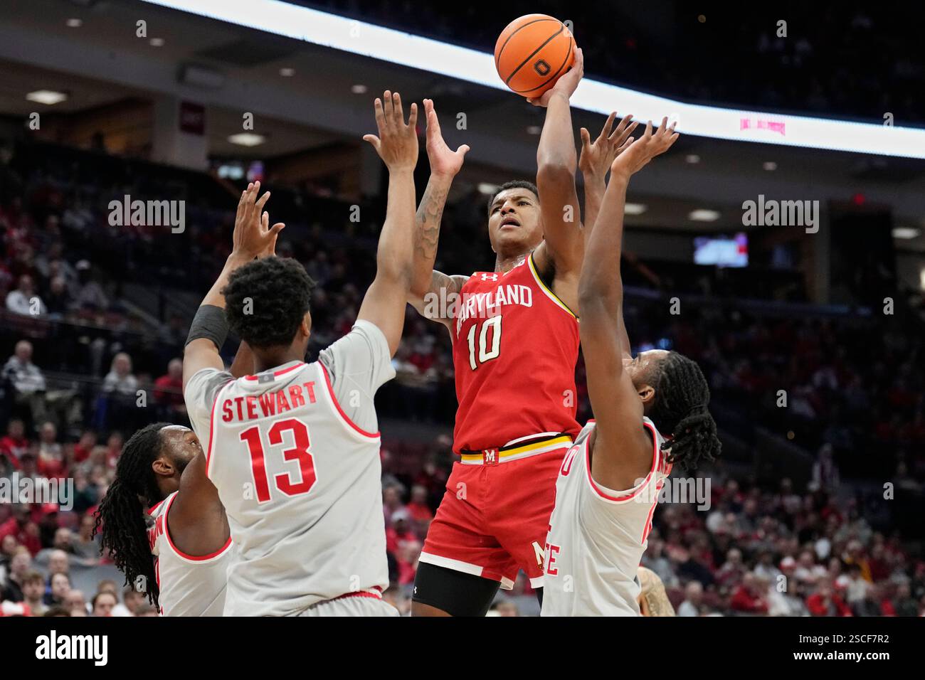 Maryland forward Julian Reese (10) looks to shoot between Ohio State ...