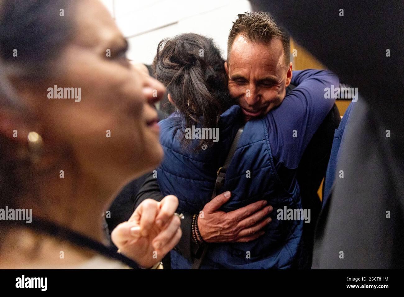 Genesee County Sheriff Chris Swanson is embraced as he announces his ...