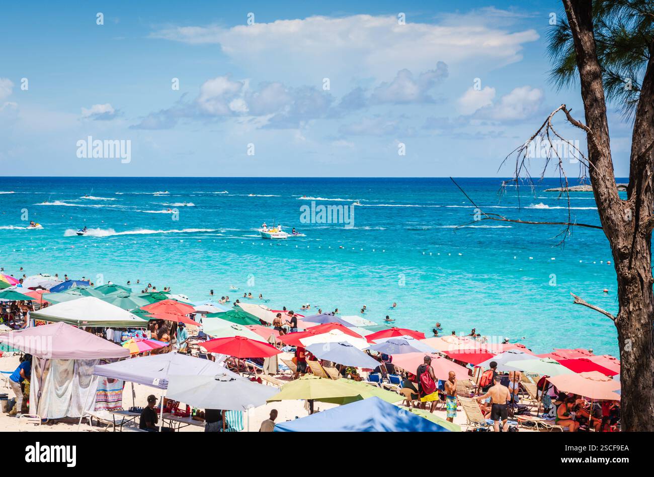 Nassau, Bahamas - August 19, 2018: Vendors line the white sand ...