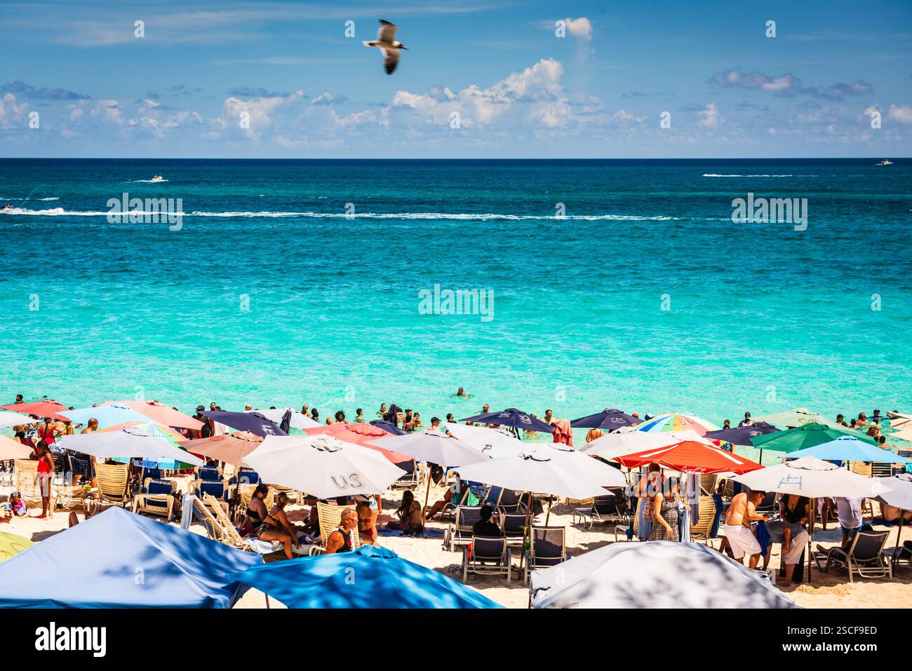 Nassau, Bahamas - August 19, 2018: Vendors line the white sand ...