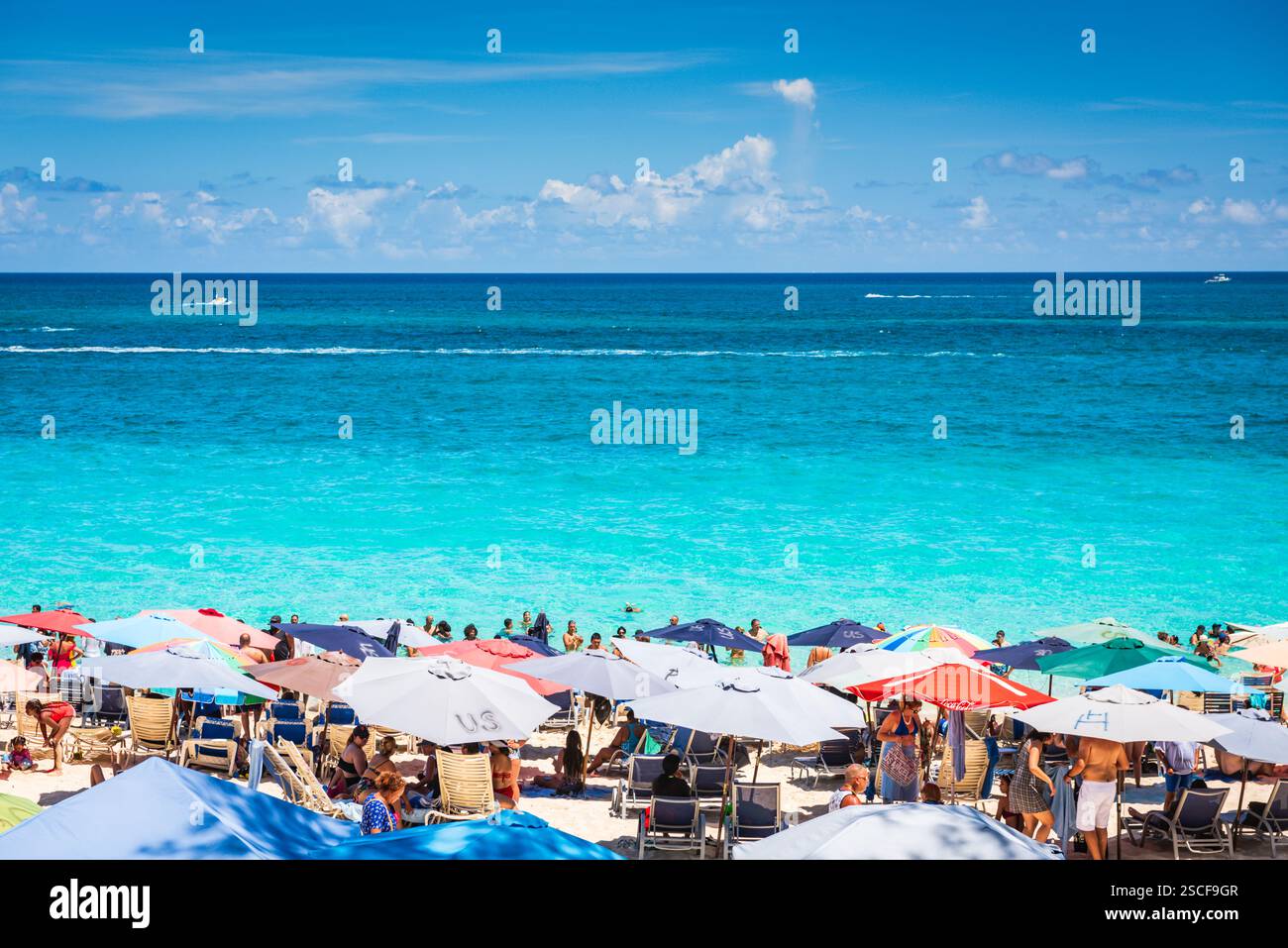 Nassau, Bahamas - August 19, 2018: Vendors line the white sand ...