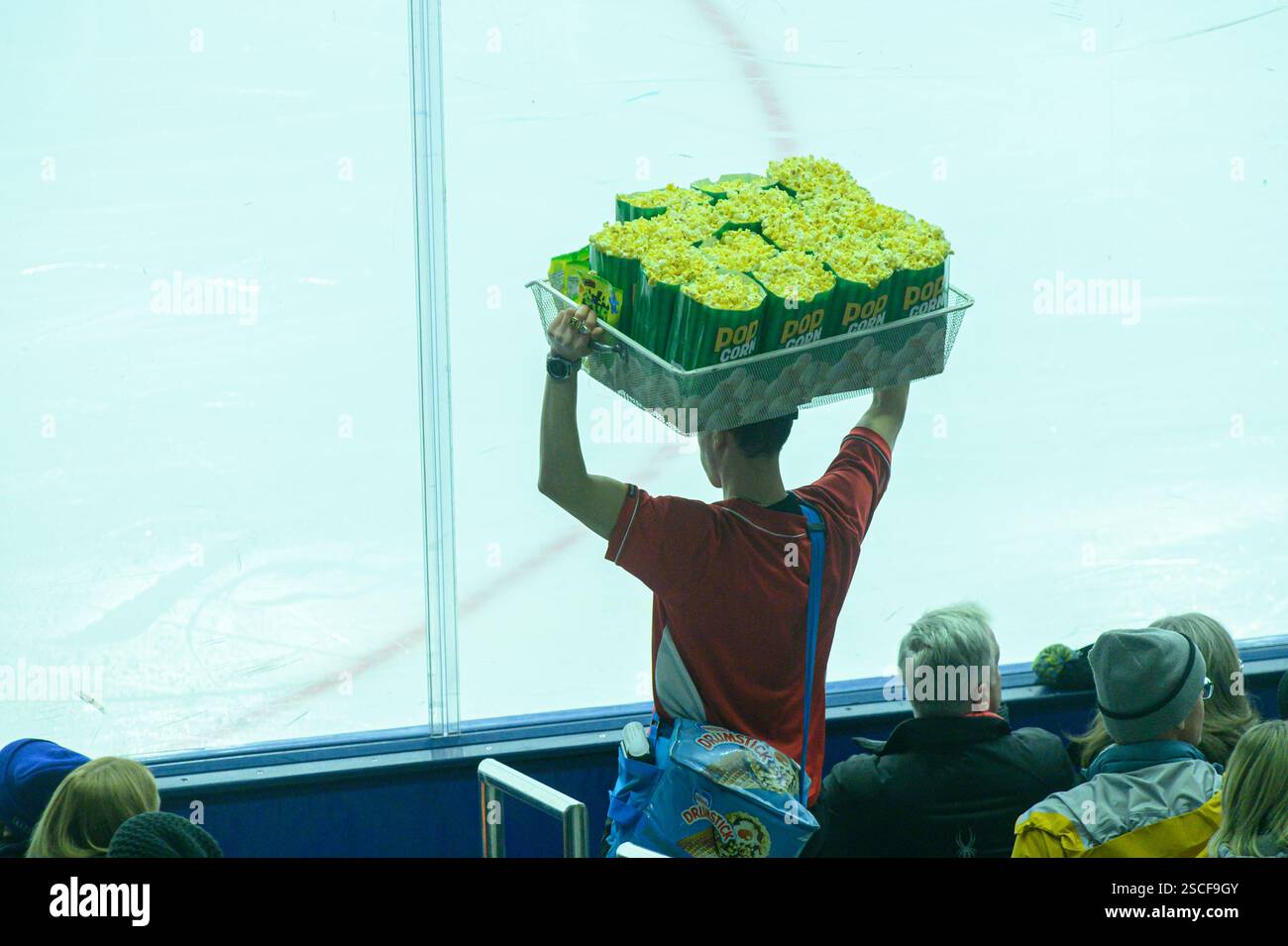 Toronto, ON, Canada – February 1, 2025: A popcorn vendor walks between ...
