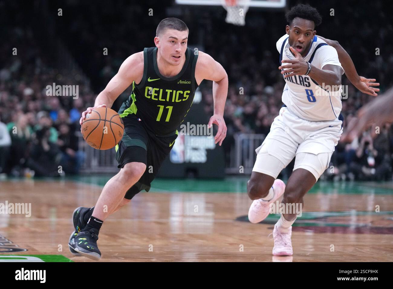 Boston Celtics guard Payton Pritchard (11) drives to the basket against ...