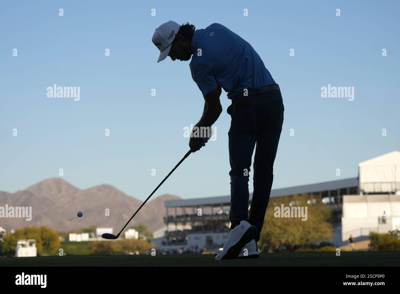 Akshay Bhatia hits his tee shot at the 17th hole during the first round of the Waste Management ...