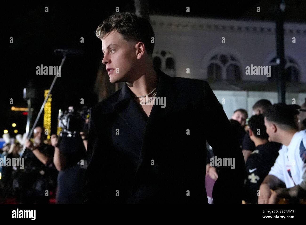 Joe Burrow, of the Cincinnati Bengals, walks the red carpet at the NFL ...