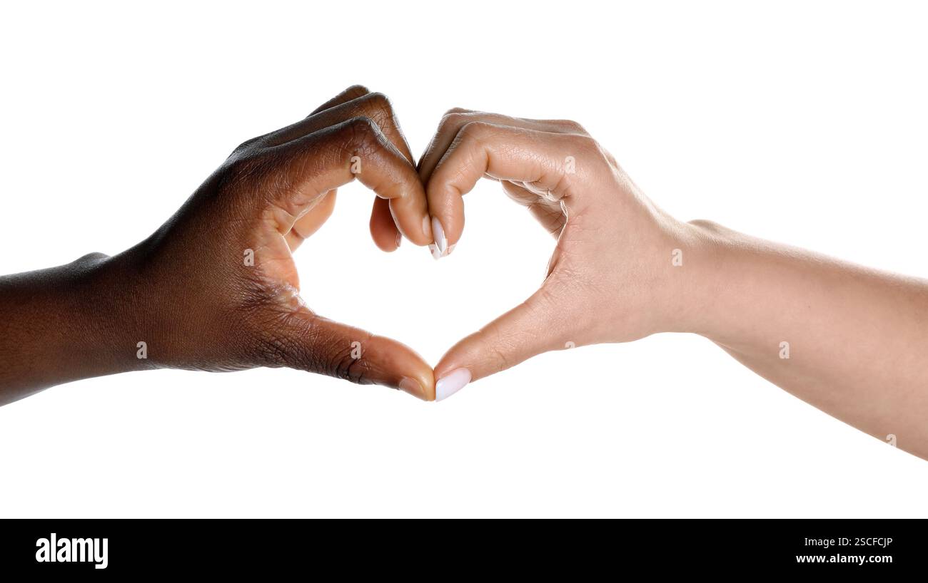 Stop racism. People of different skin colors making heart with hands on ...