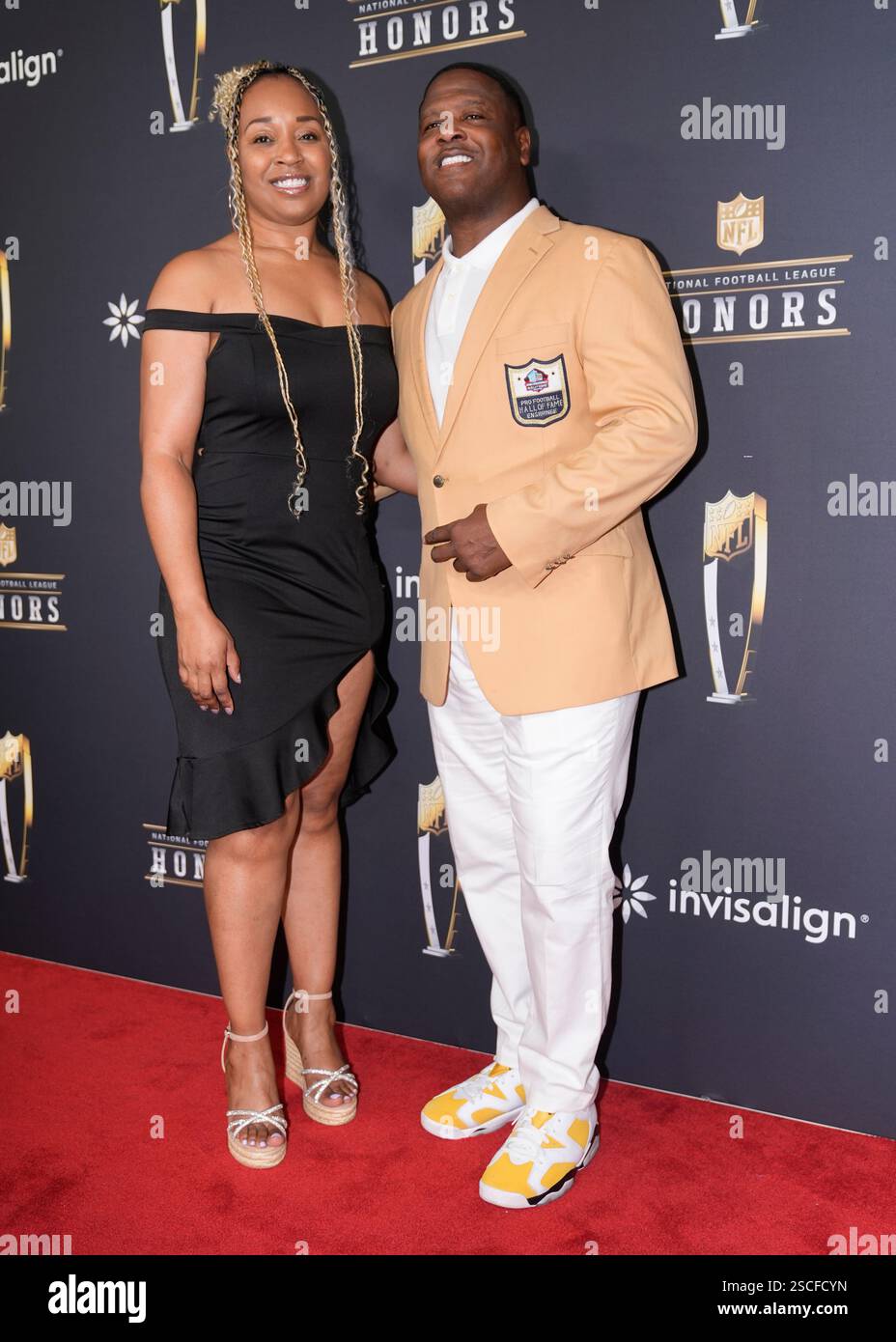 NFL Hall of Fame LeRoy Butler and his wife, Genesis Butler, pose on the ...