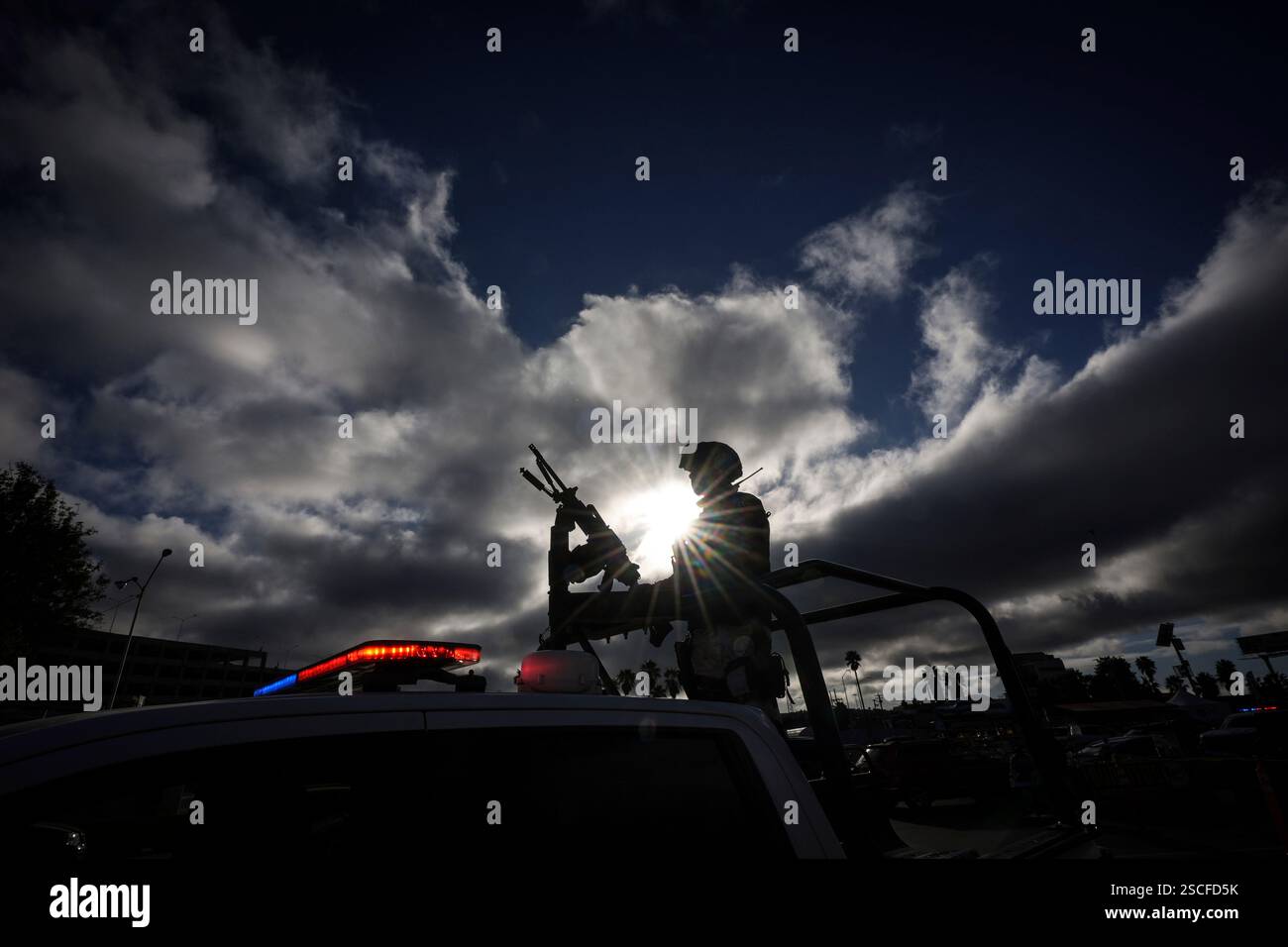 Members of Mexico's National Guard stand guard at an inspection ...