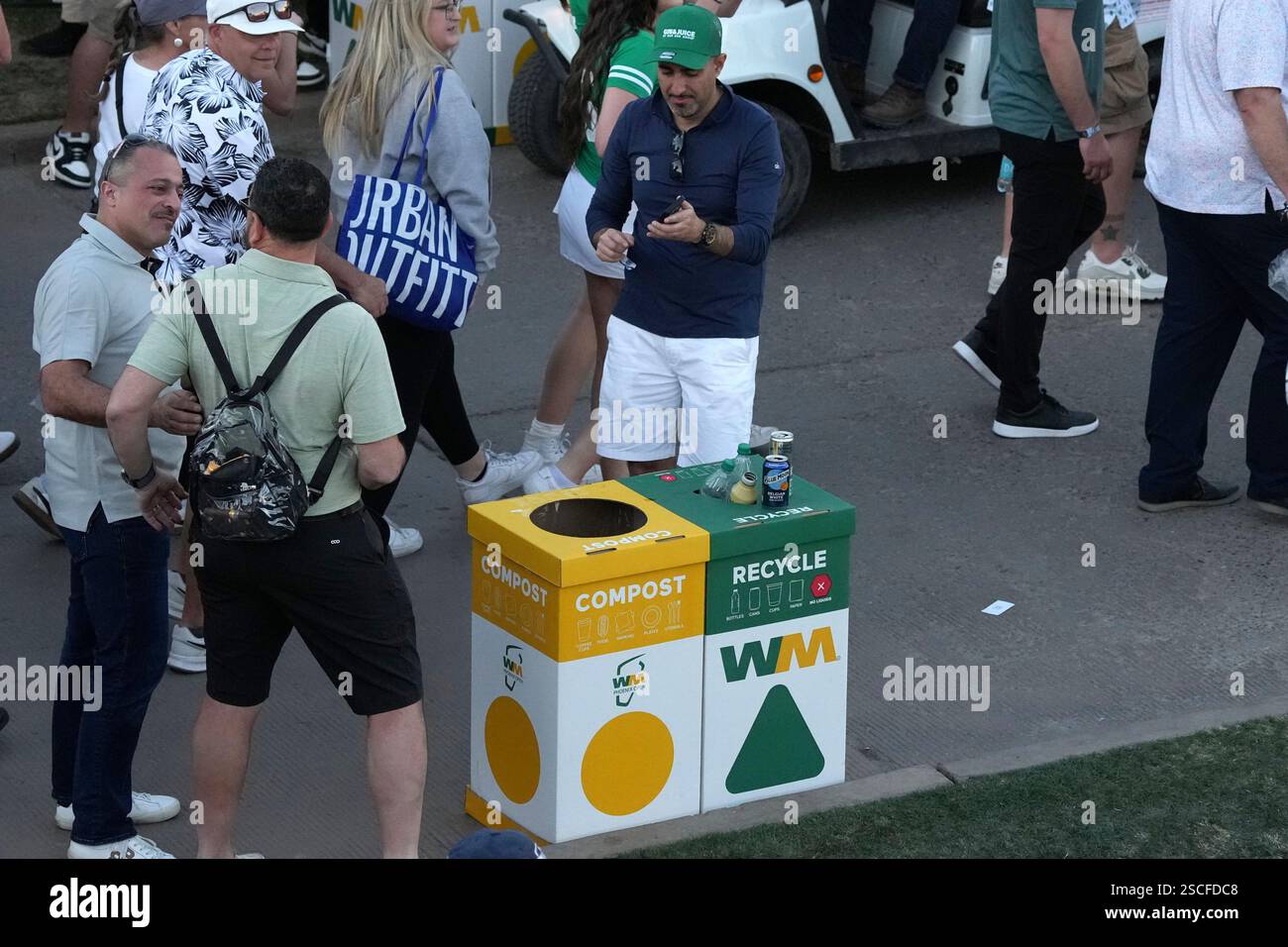 The gallery walks past some of the Waste Management bins at the 18th ...