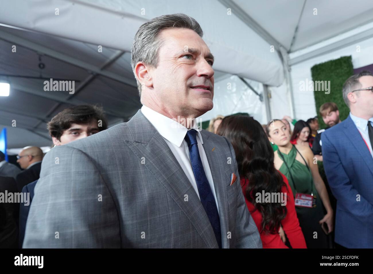 Actor Jon Hamm walks the red carpet before the NFL Honors award show ...