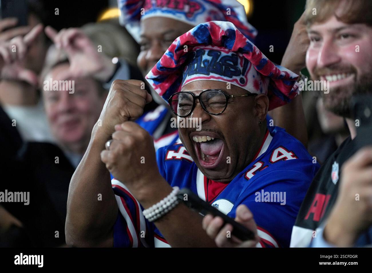 Fans cheer on the red carpet before the NFL Honors award show ahead of ...