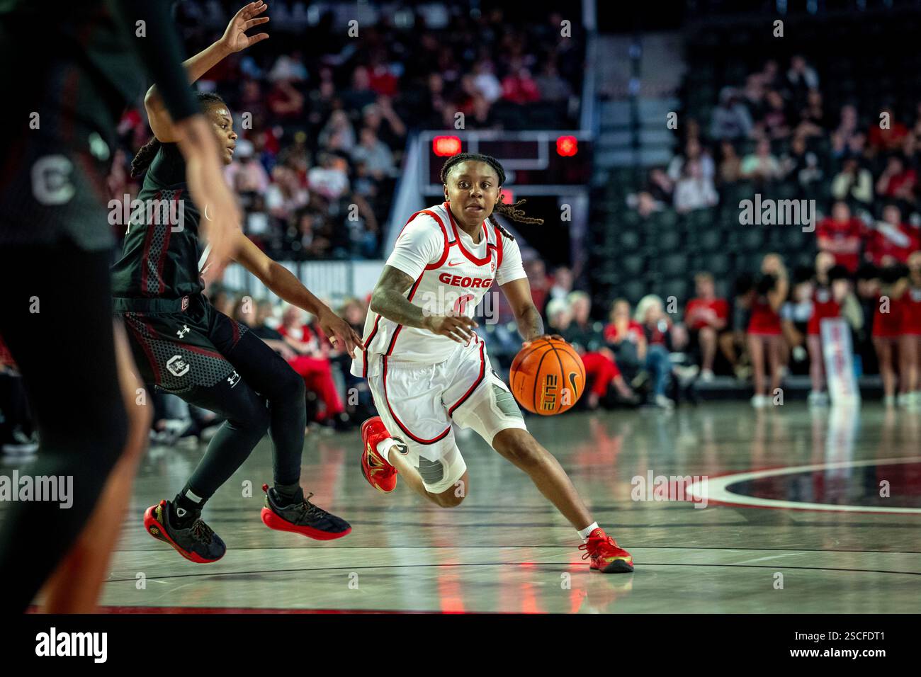 Georgia guard Trinity Turner, right, moves the ball against South ...