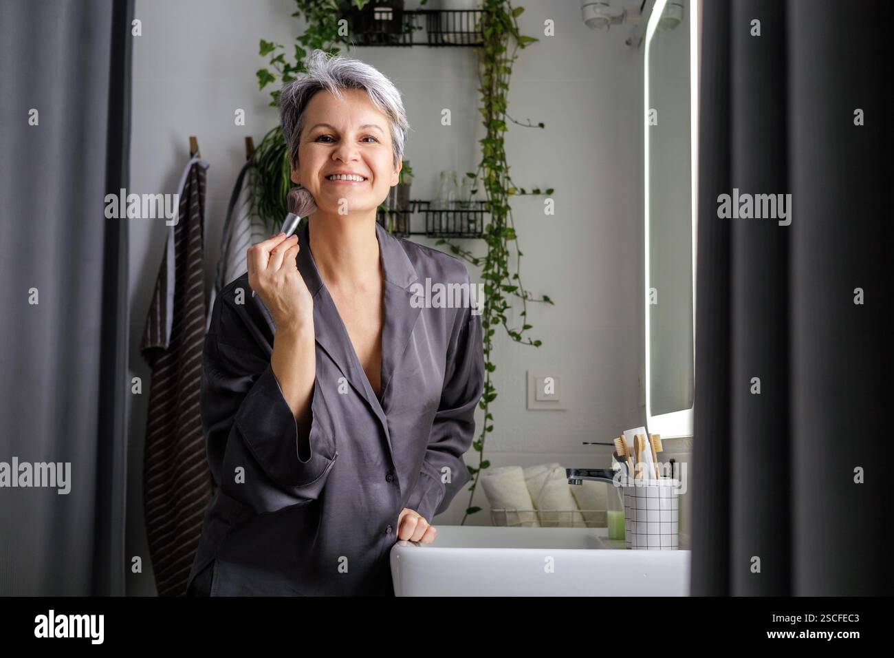 Mature happy aged beautiful woman during menopause with grey hair ...