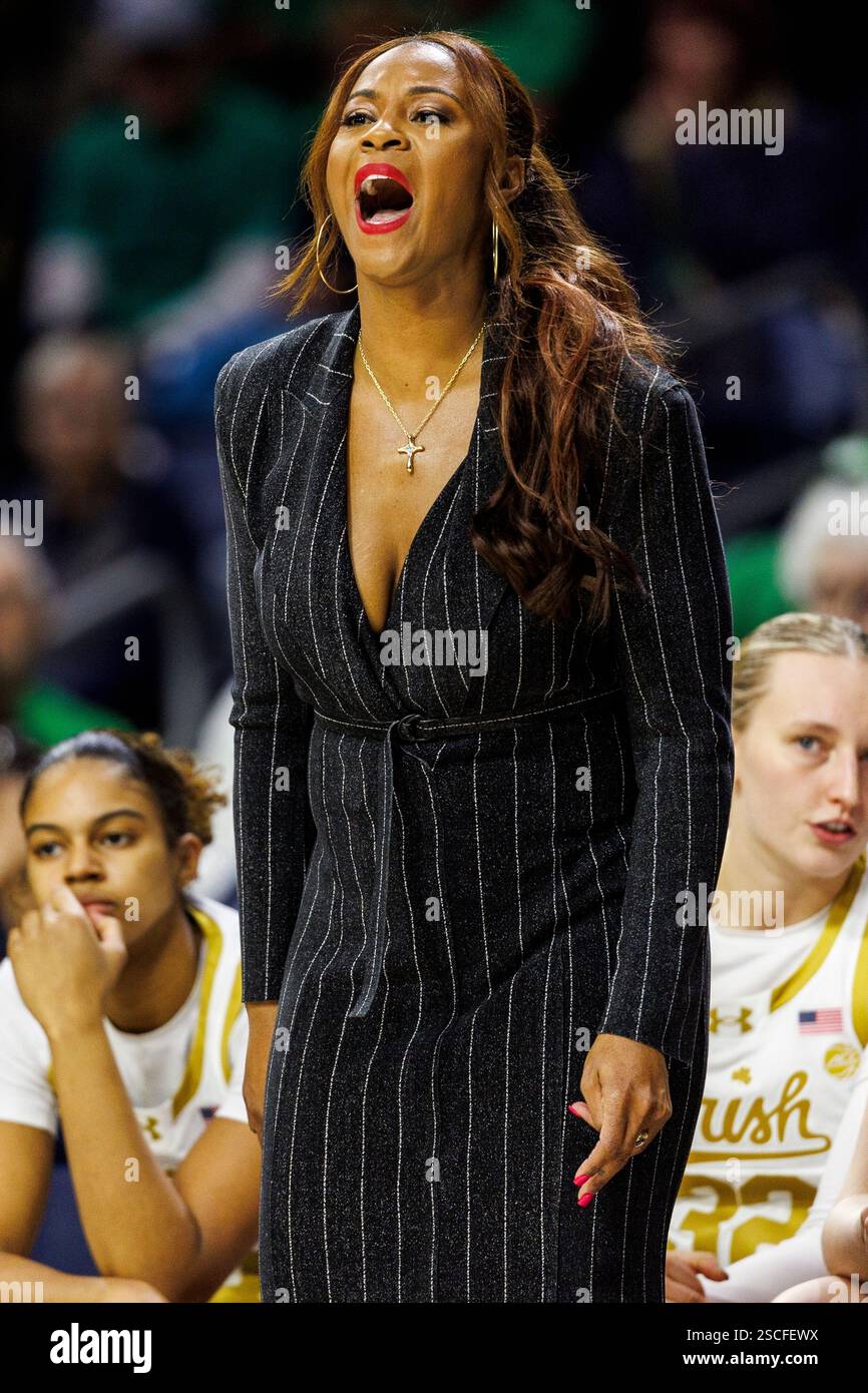 Notre Dame head coach Niele Ivey shouts instructions to her team during the first half of an ...