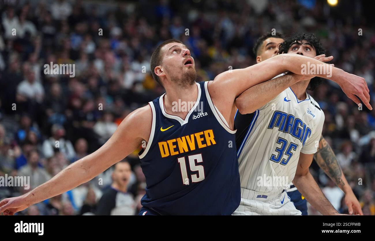 Denver Nuggets center Nikola Jokic (15) battles for position for a ...