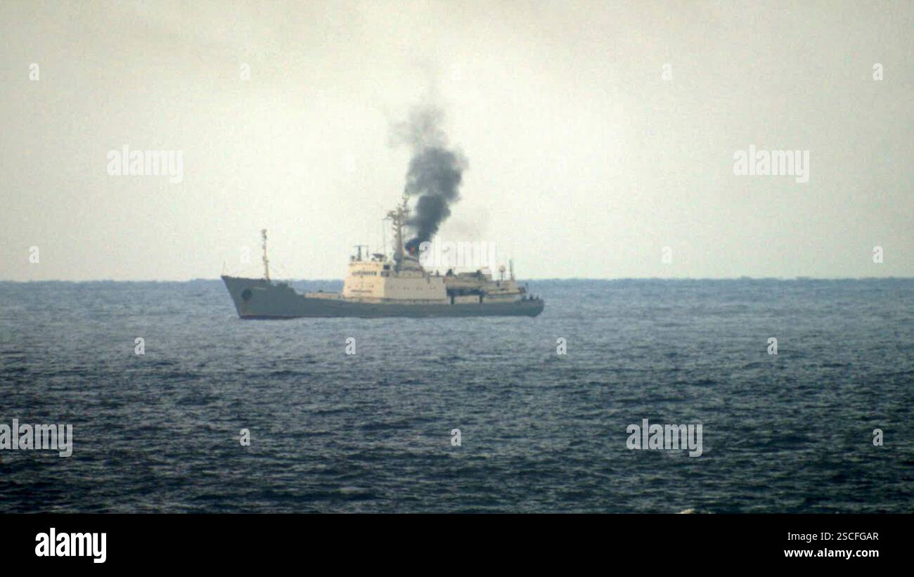 Military officials say this photo taken from a nearby vessel shows ...