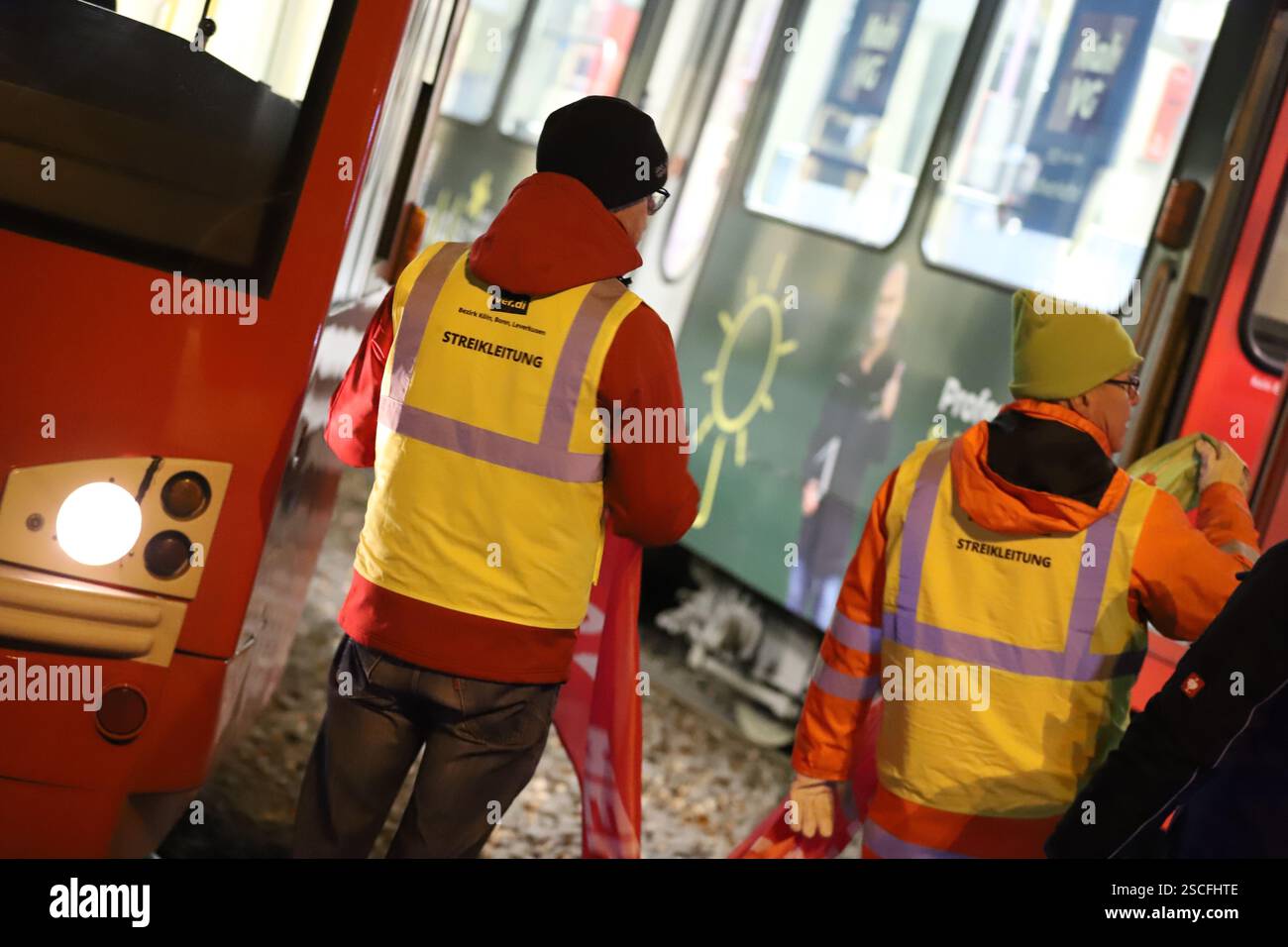 Cologne, Germany. 07th Feb, 2025. Strikers stand in front of trains ...