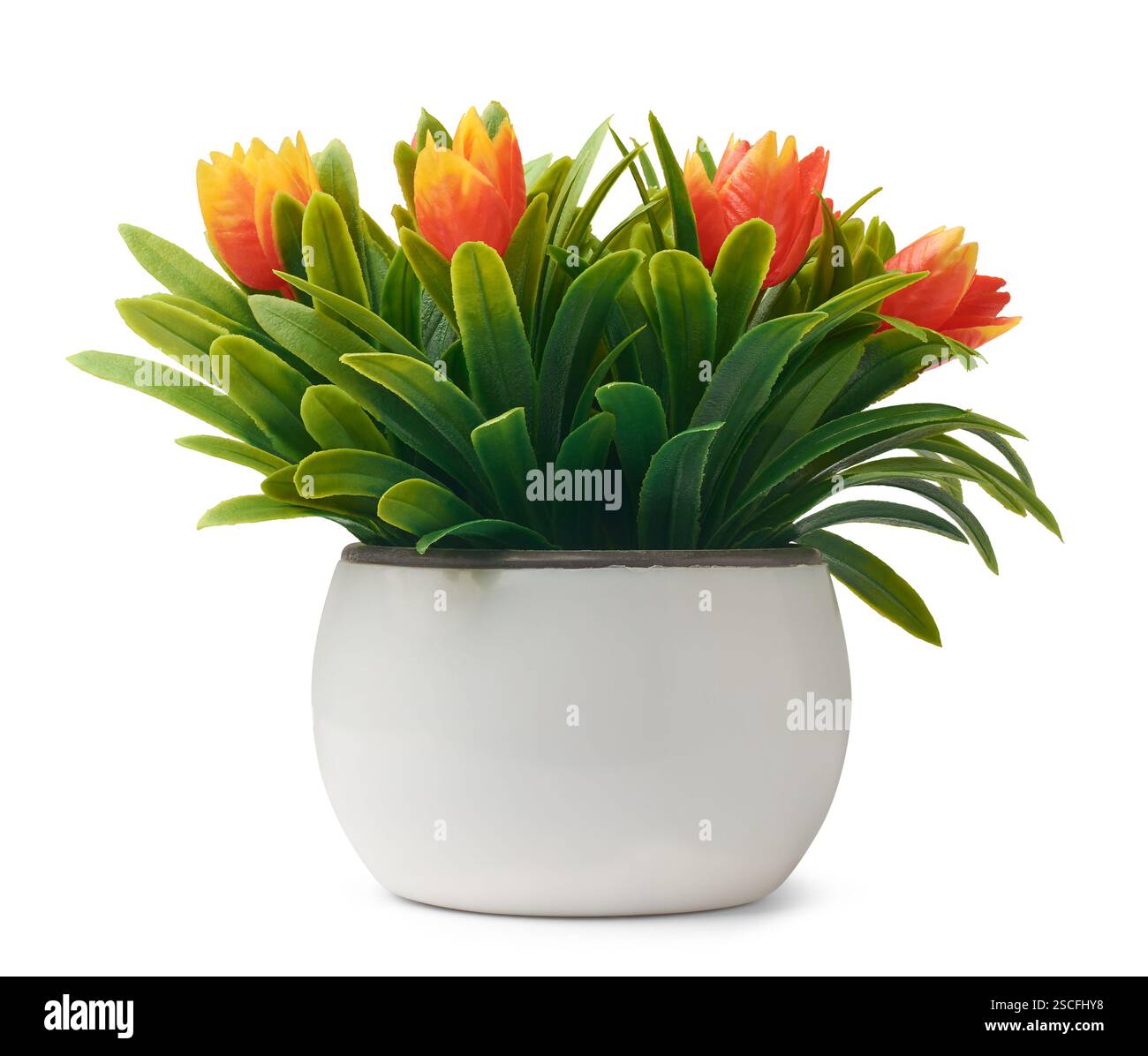 artificial arrangement of potted plant of bright orange tulip shaped ...