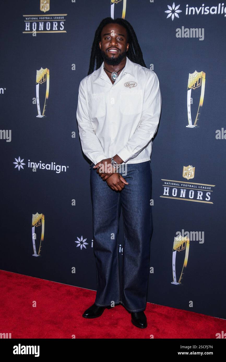 Shaboozey walking on the red carpet at NFL Honors at the Saenger ...