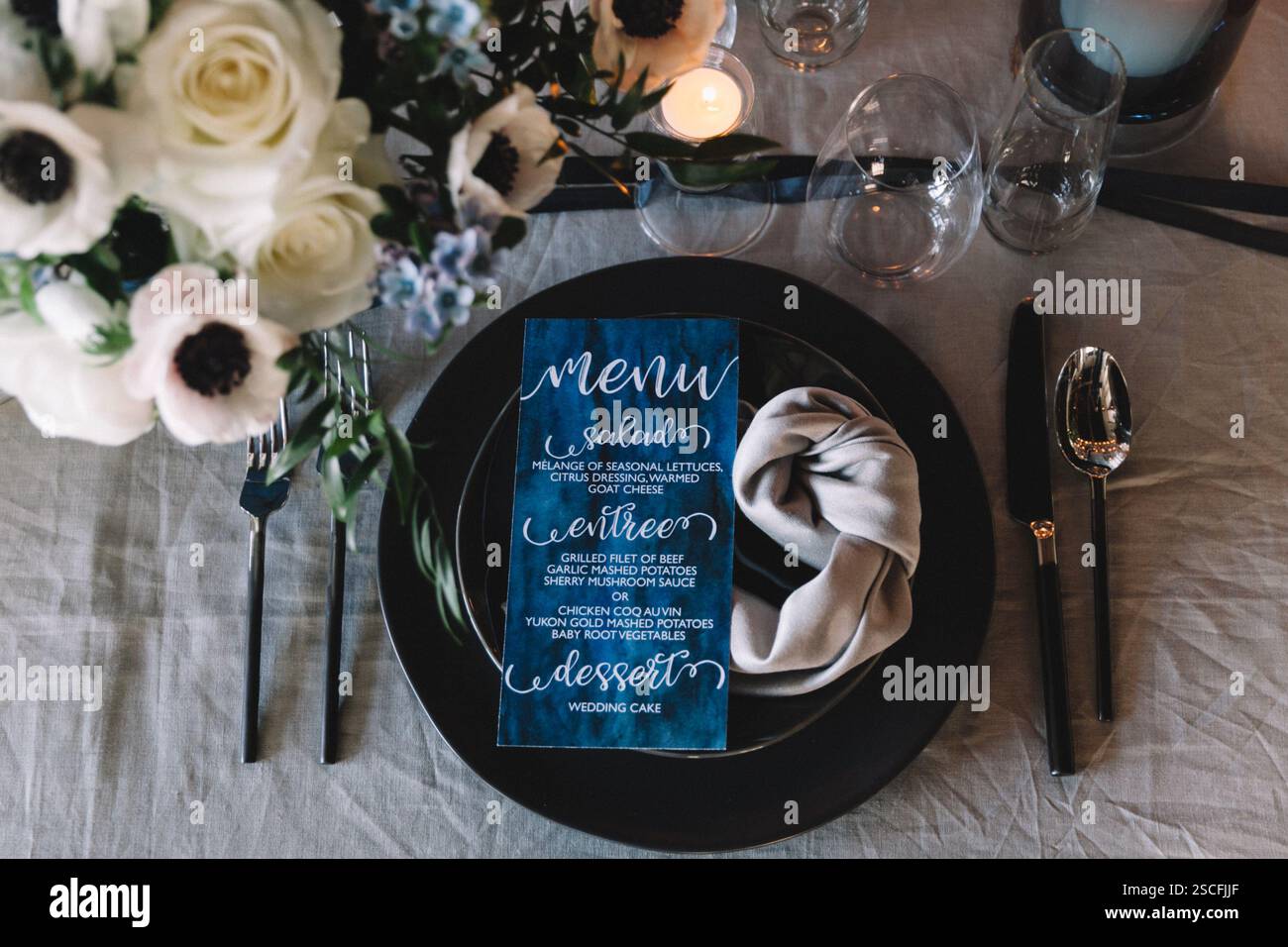 A stylish dining setup showcases an elegant table with a beautifully ...