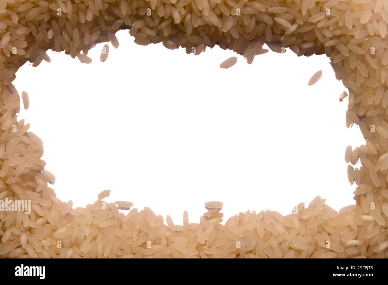 Fine grains of rice create a decorative border around an empty space ...