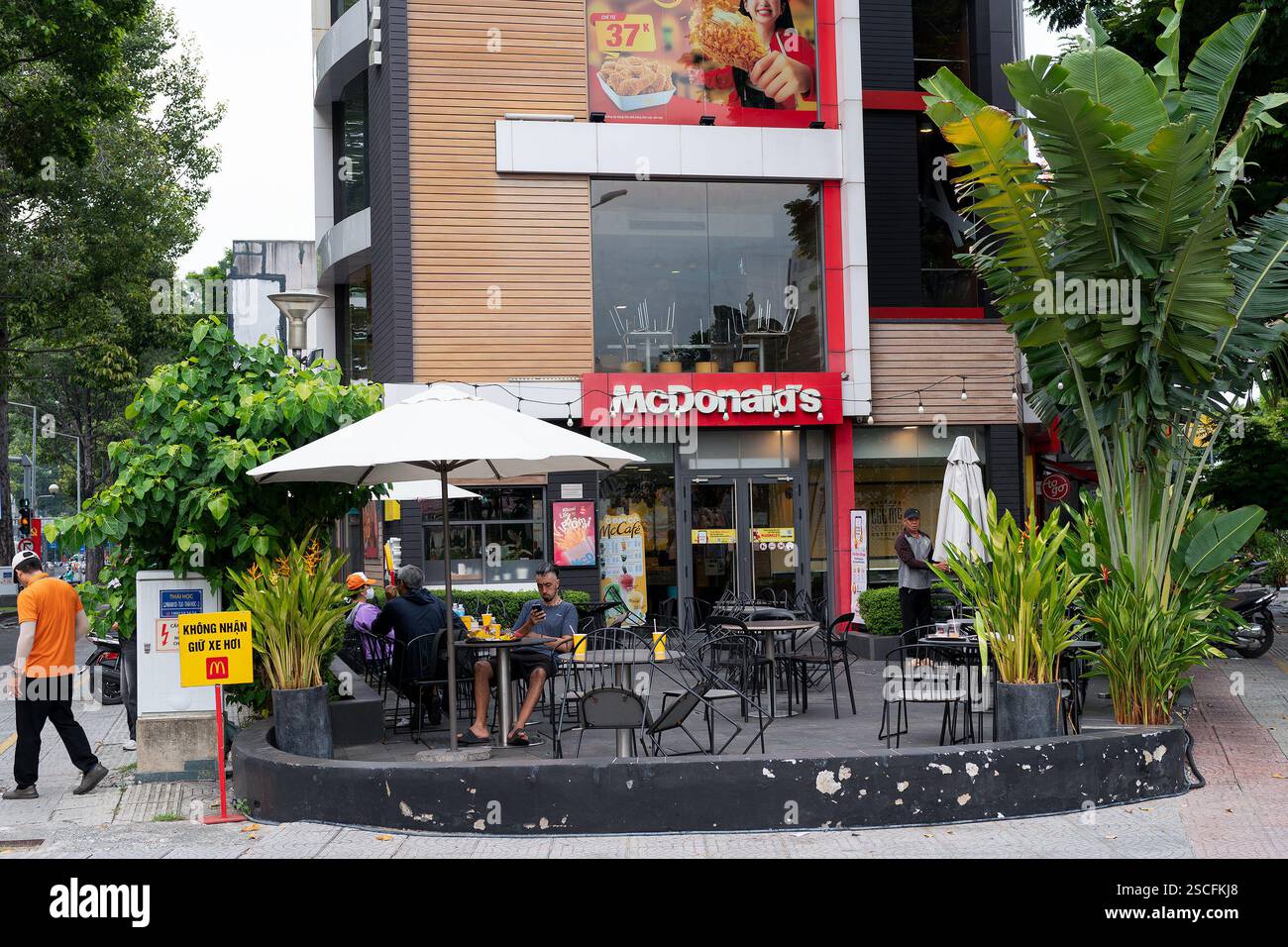 Ho Chi Minh, Vietnam - August 24, 2024: a daytime street-level view of McDonald's fast food ...