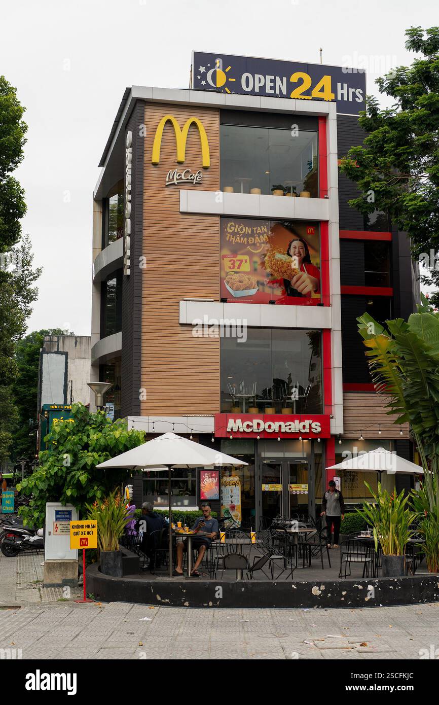 Ho Chi Minh, Vietnam - August 24, 2024: a daytime street-level view of ...