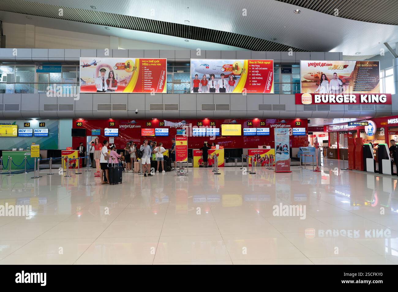 Cam Ranh, Vietnam - August 21, 2024: VietJet Air check-in counters at ...