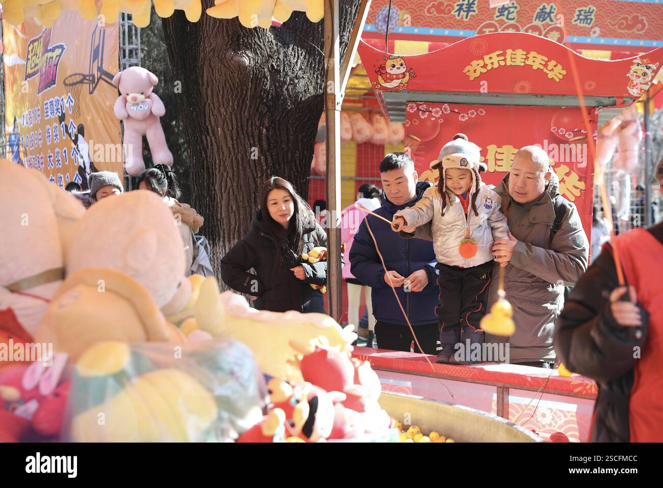 **CHINESE MAINLAND, HONG KONG, MACAU AND TAIWAN OUT** People stroll at ...
