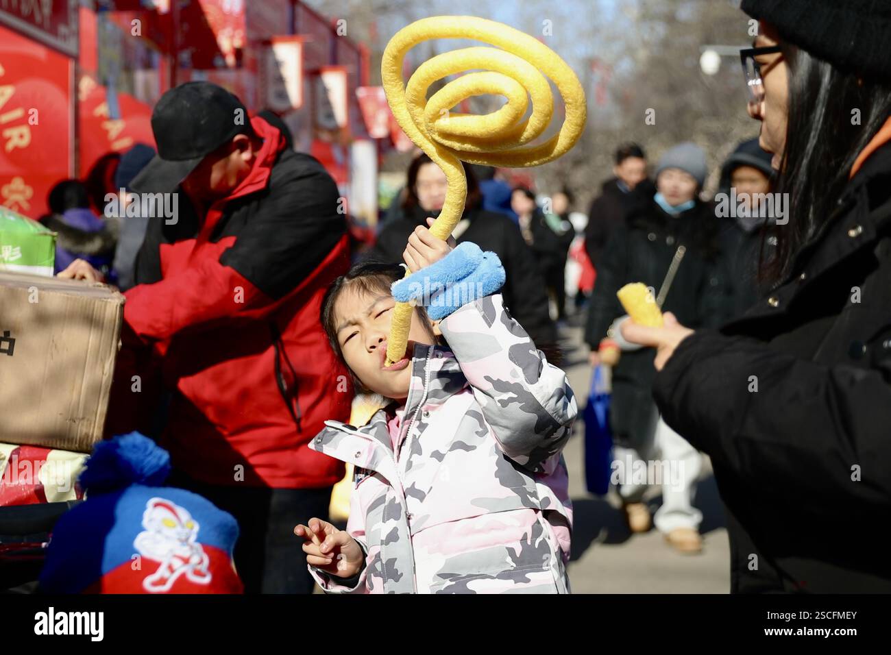 **CHINESE MAINLAND, HONG KONG, MACAU AND TAIWAN OUT** People stroll at ...