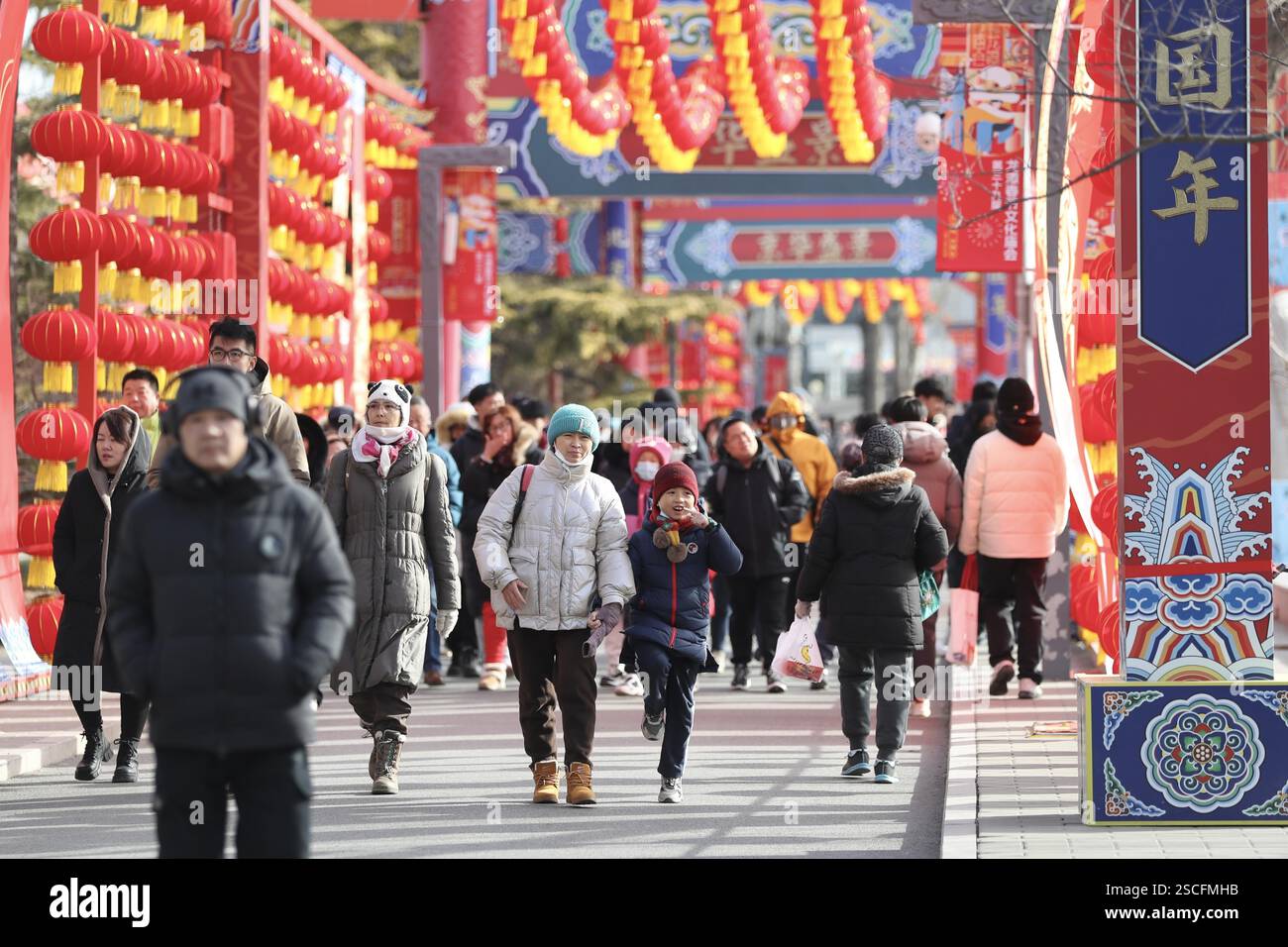 **CHINESE MAINLAND, HONG KONG, MACAU AND TAIWAN OUT** People stroll at ...