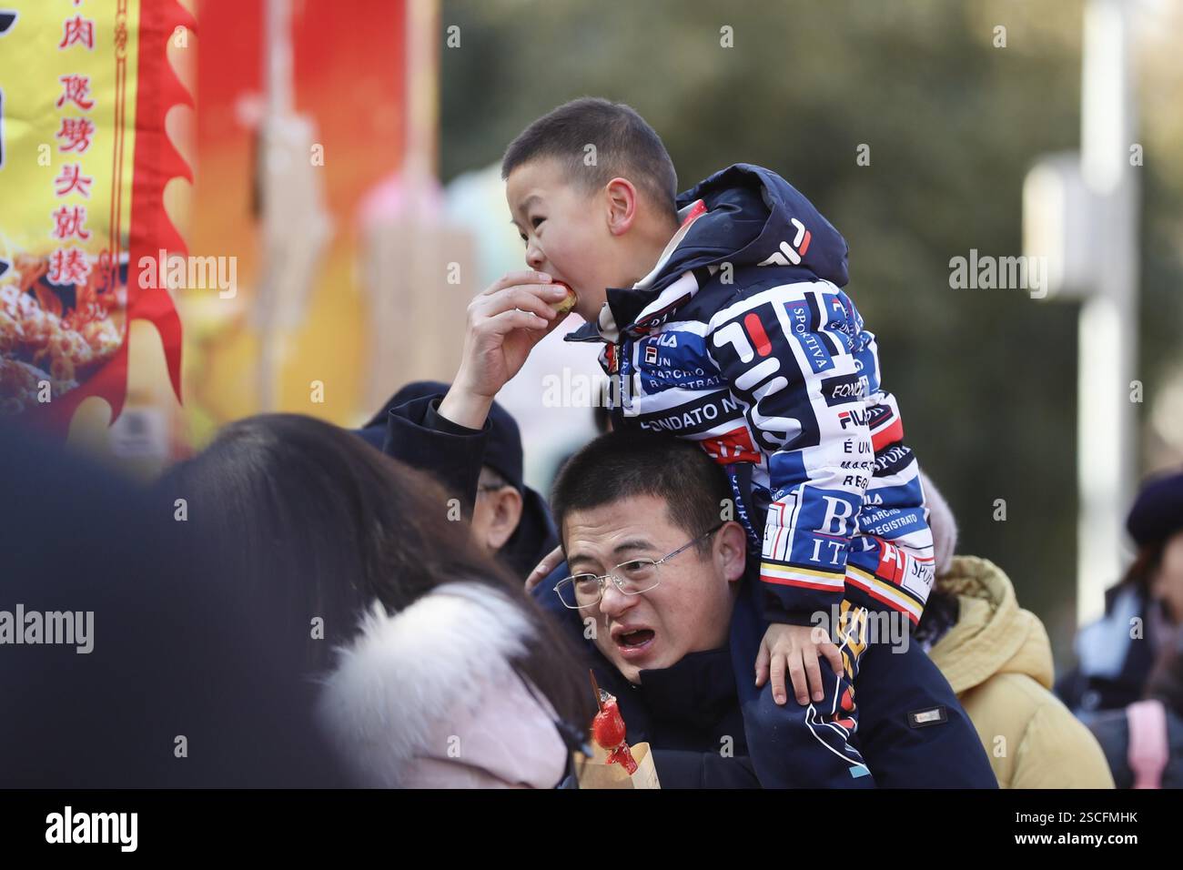 **CHINESE MAINLAND, HONG KONG, MACAU AND TAIWAN OUT** People stroll at ...
