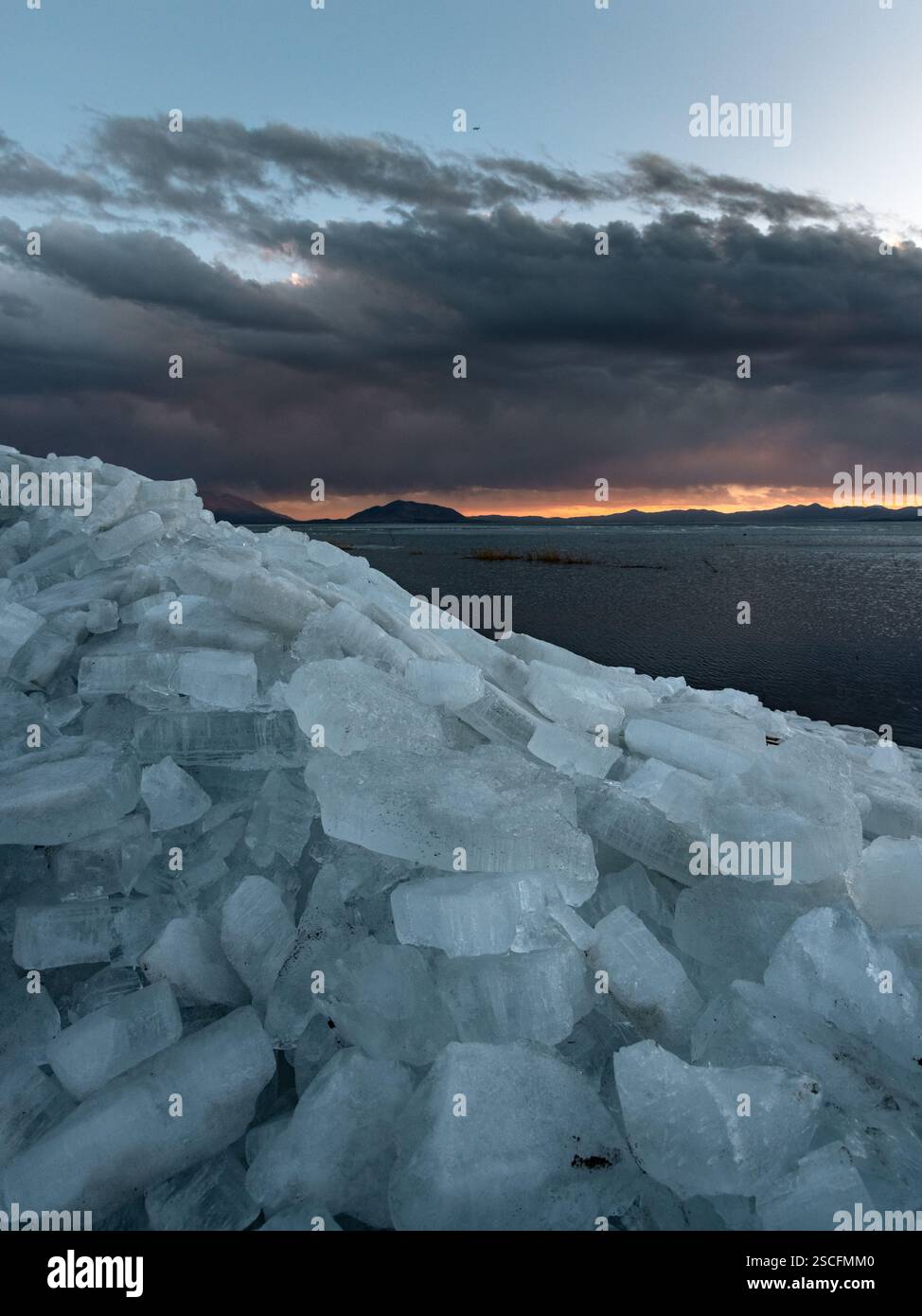 Ice stacks on Utah Lake during blue hour Stock Photo - Alamy