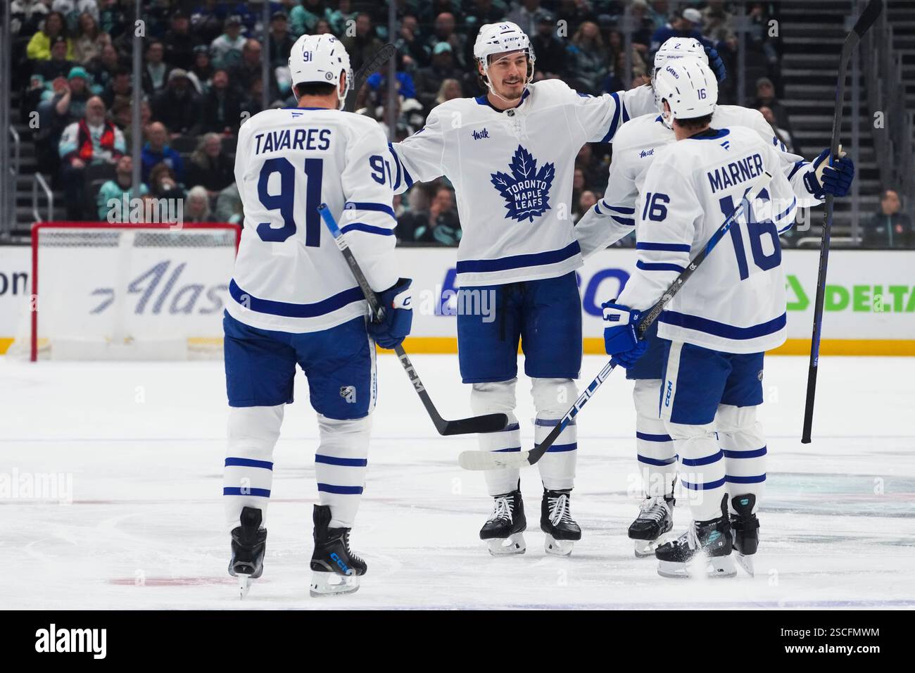Toronto Maple Leafs defenseman Philippe Myers, center facing ...