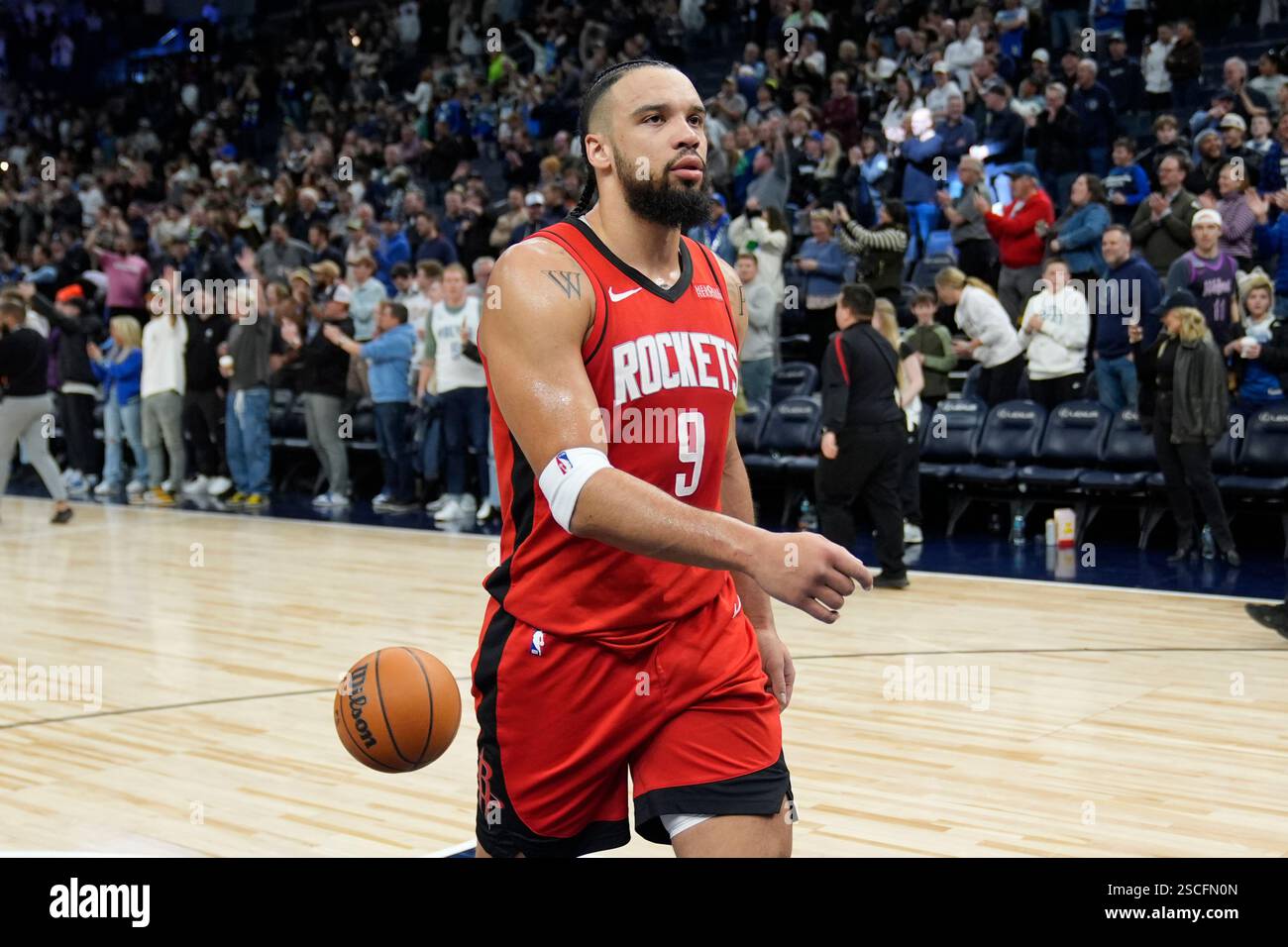 Houston Rockets forward Dillon Brooks (9) walks off the court after an ...