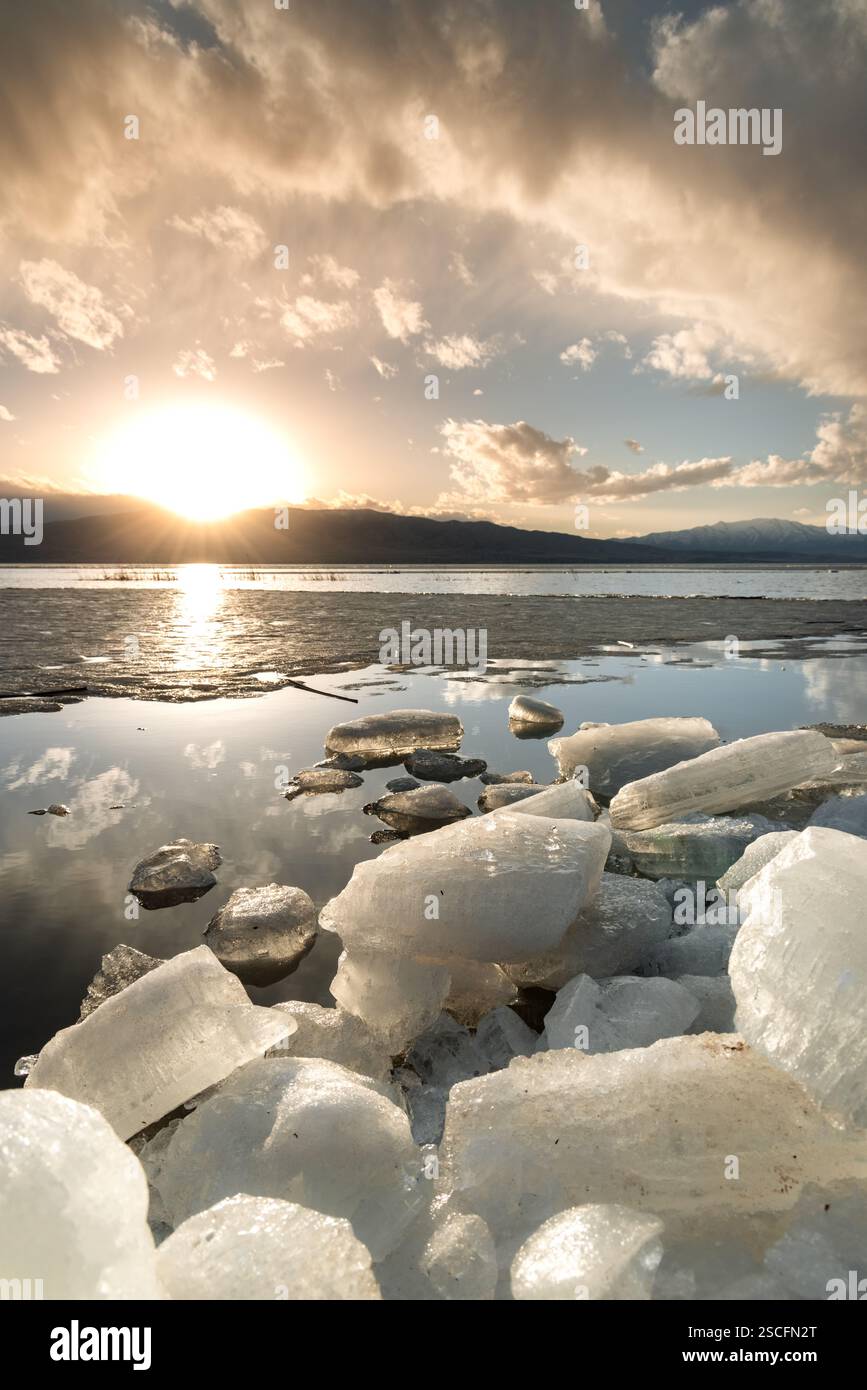 Ice stacks in vertical image at Vineyard Beach on Utah Lake in Utah at ...