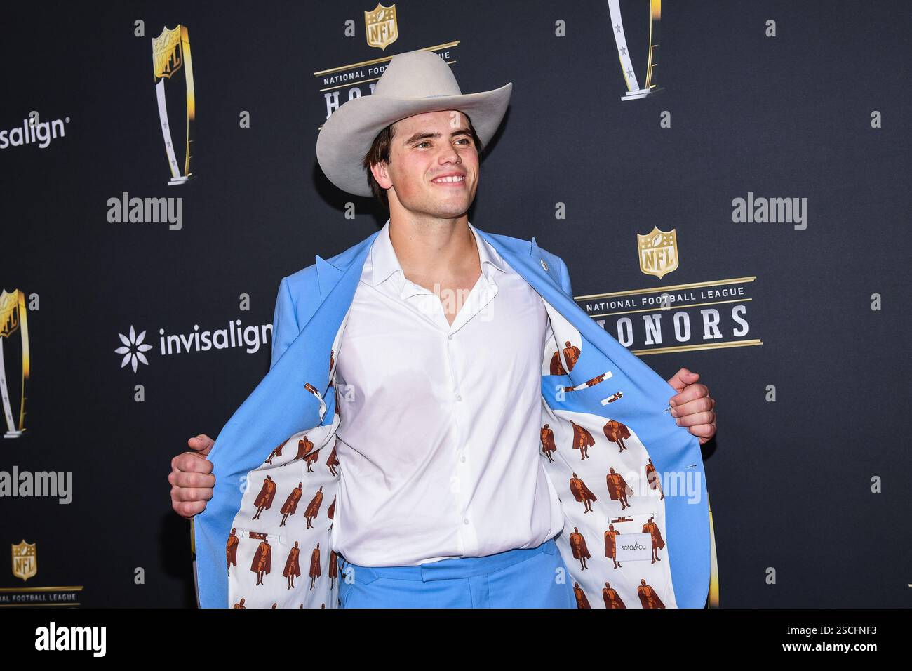 Cameron Dicker walking on the red carpet at NFL Honors at the Saenger ...