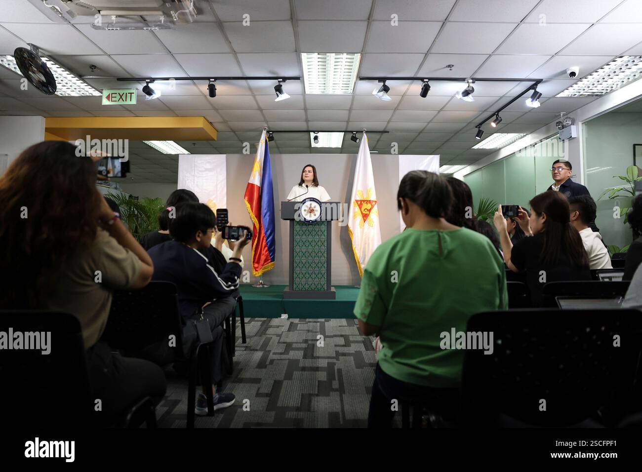 Philippine Vice President Sara Duterte gestures as she speaks during a ...