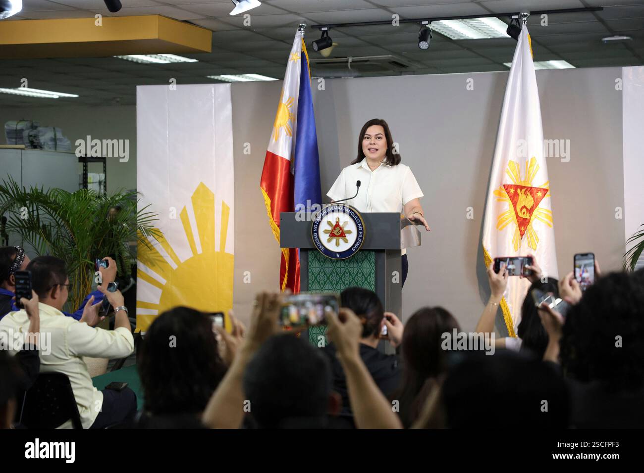 Philippine Vice President Sara Duterte gestures as she speaks during a ...