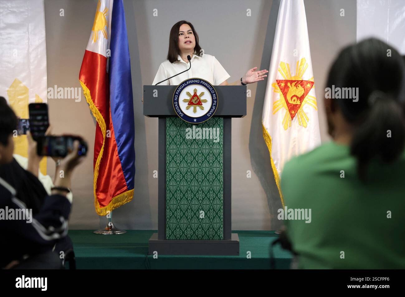 Philippine Vice President Sara Duterte gestures as she speaks during a ...