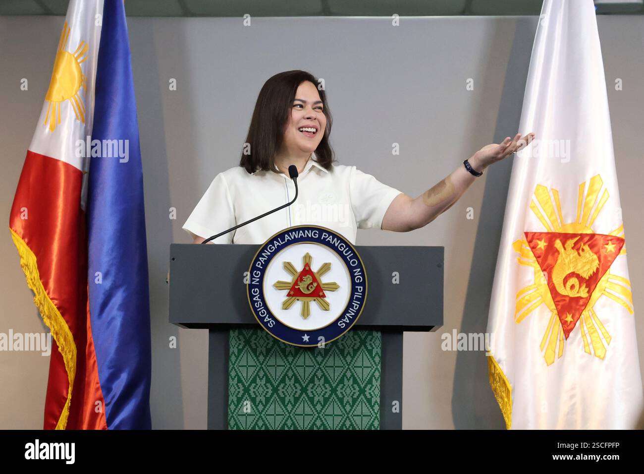 Philippine Vice President Sara Duterte gestures as she speaks during a ...