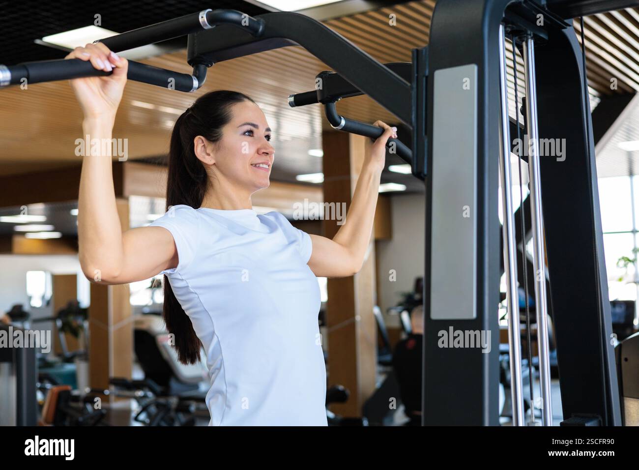 Young beautiful Asian woman with athletic build and good figure doing ...