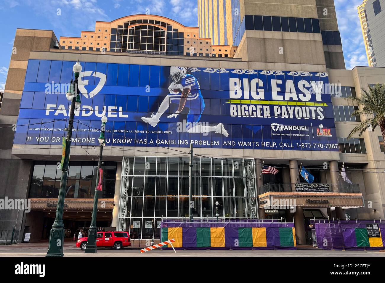 A billboard for FanDuel hangs on a building on Canal Street in the ...
