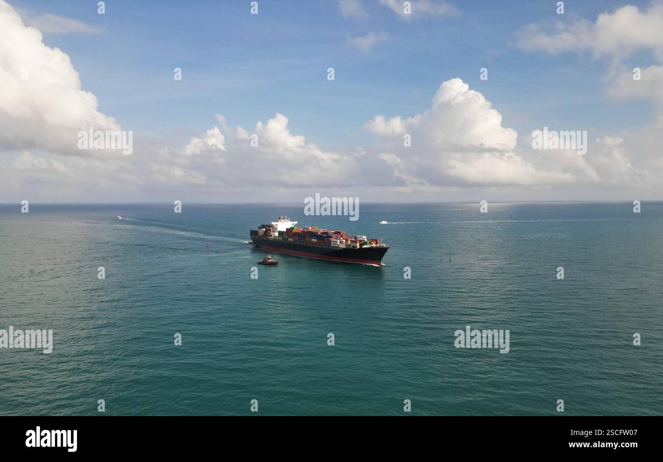 Freight container loaded on cargo vessel. Aerial view cargo ship ...
